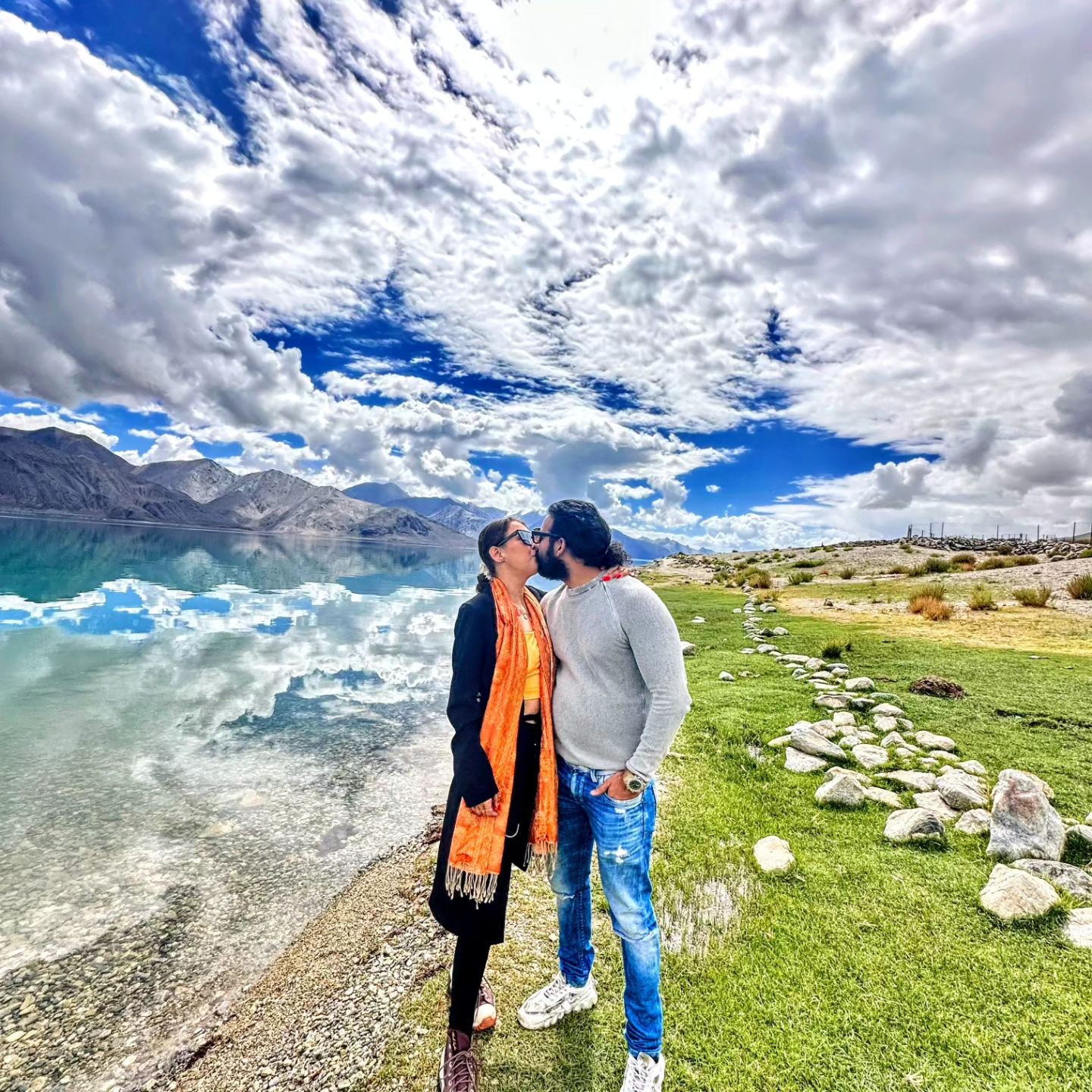 Two years after his split from Jen, Rishi is showing off his new wife ...